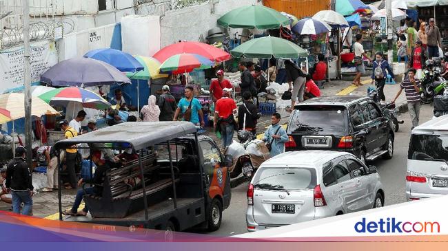 Merawat Sektor Informal