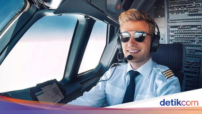 Potret Pilot Ganteng yang Senang ke Pantai