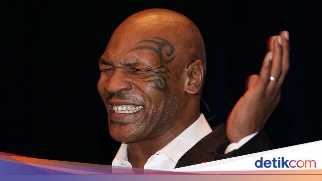Arti Tato di Muka Mike Tyson