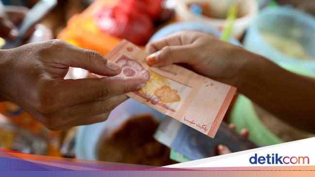 Foto: Belanja di Batas Negeri, Bisa Bayar Pakai Rupiah-Ringgit