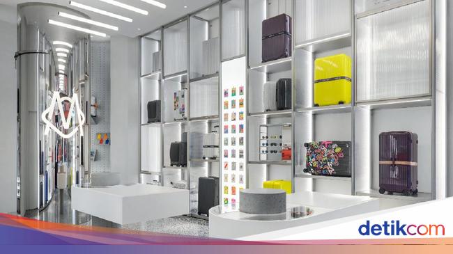 Unik Nih, Toko Koper Mewah Ini Punya Stand Keren Buat Foto Paspor