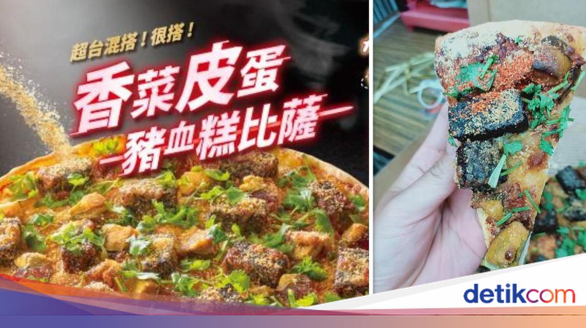 Gerai Pizza Ini Luncurkan Pizza Topping Telur Pitan dan Darah Babi