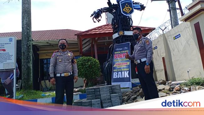 Polres Tasik Ubah Knalpot Brong Jadi Patung Robot Transformers