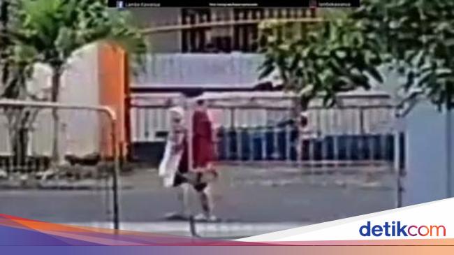 Sosok Wanita Berbaju Merah Penculik Balita di Sulut Terekam CCTV Sosok Wanita Berbaju Merah Penculik Balita di Sulut Terekam CCTV