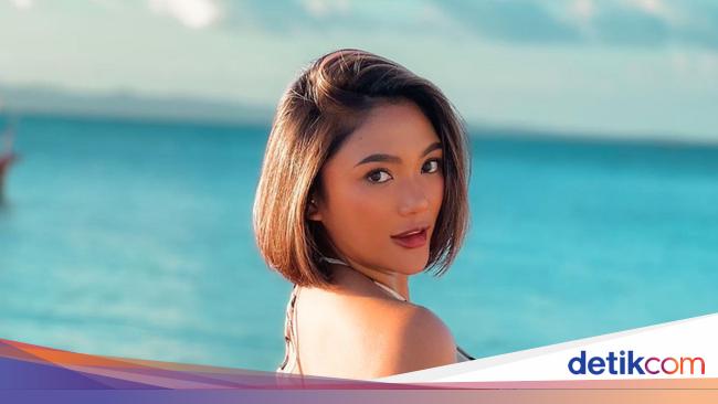7 Potret Terbaru Marion Jola Liburan ke Kupang, Tato di Pinggang Curi ...