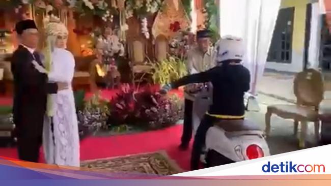 Aksi Santai Biker Wanita Terobos Tenda Resepsi Pernikahan Bikin Gemas