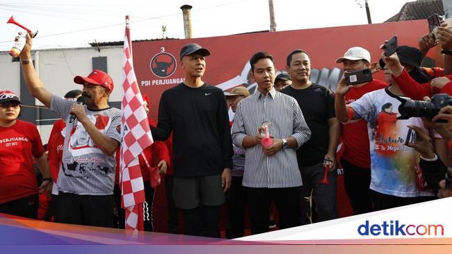 Kenakan Baju Garis Hitam Putih di Solo, Gibran: Diberi Langsung Ganjar Kenakan Baju Garis Hitam Putih di Solo, Gibran: Diberi Langsung Ganjar