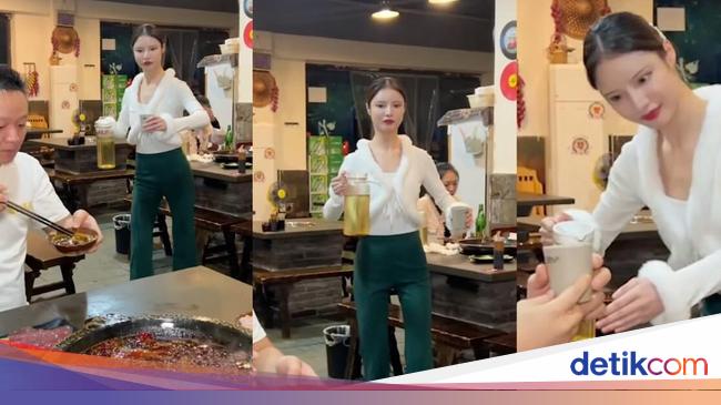 Pelayan Restoran di China Ini Pura-pura Jadi Robot Saat Layani Pembeli