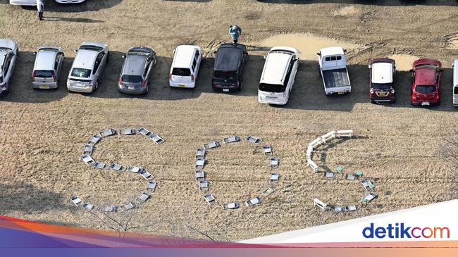 Minta Bantuan! Korban Gempa Jepang Bikin Tanda 'SOS'