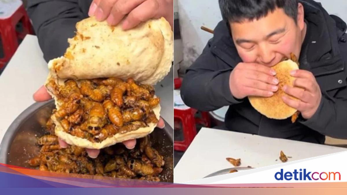Ngeri! Pria Ini Mukbang Burger Isi Ulat Sagu Goreng