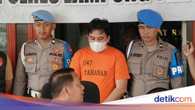 Penampakan Anggota DPRD Lampung Tengah Mukadam Berbaju Tahanan