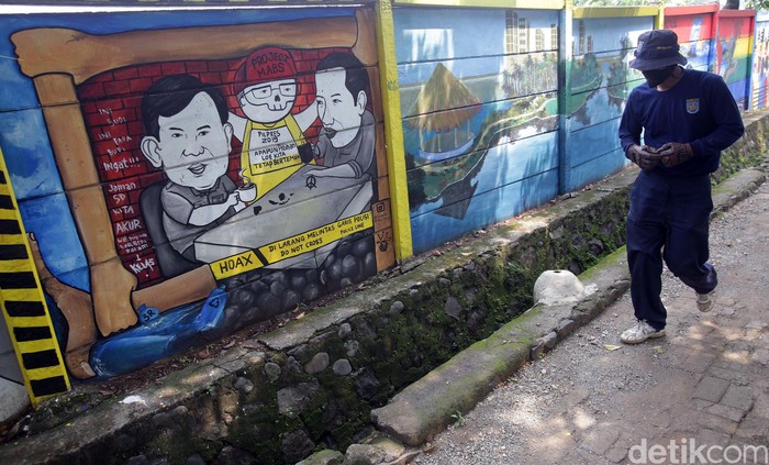 Mural Jokowi Prabowo Ngopi Bareng di Depok