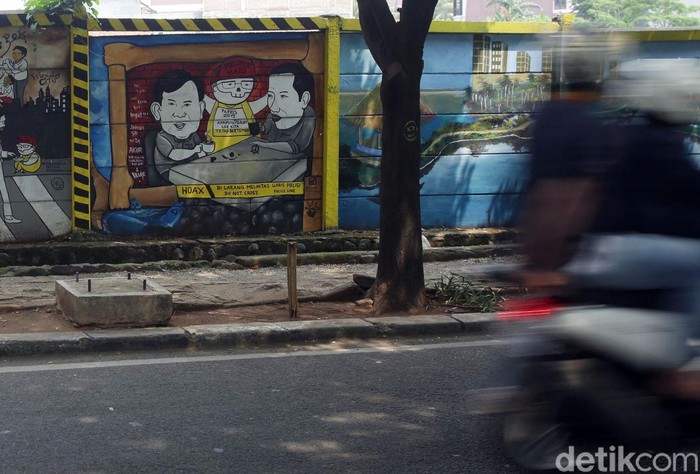 Mural Jokowi Prabowo Ngopi Bareng di Depok