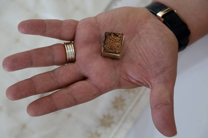 Al-Qur'an Seukuran Prangko di Albania yang Punya Sejarah Unik