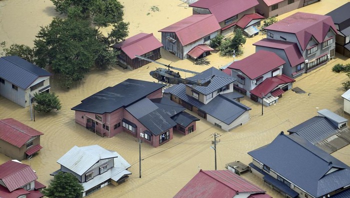 Hujan Lebat Picu Banjir di Jepang Utara Hujan Lebat Picu Banjir di Jepang Utara