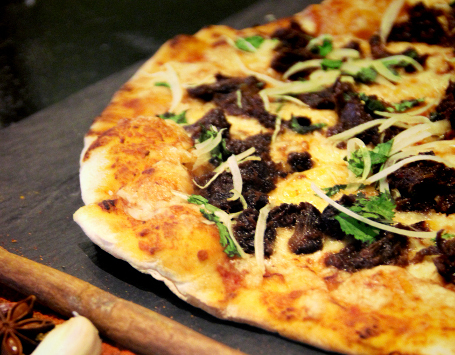 Ada Pizza Rendang dan Chocolate Chip Cookie Cheesecake Enak di OPEN Cafe